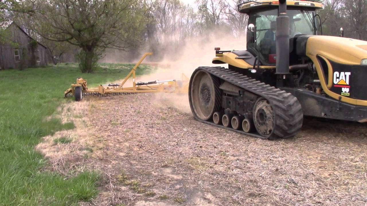 Challenger MT855 Tractor with a Phillips Rotary Harrow